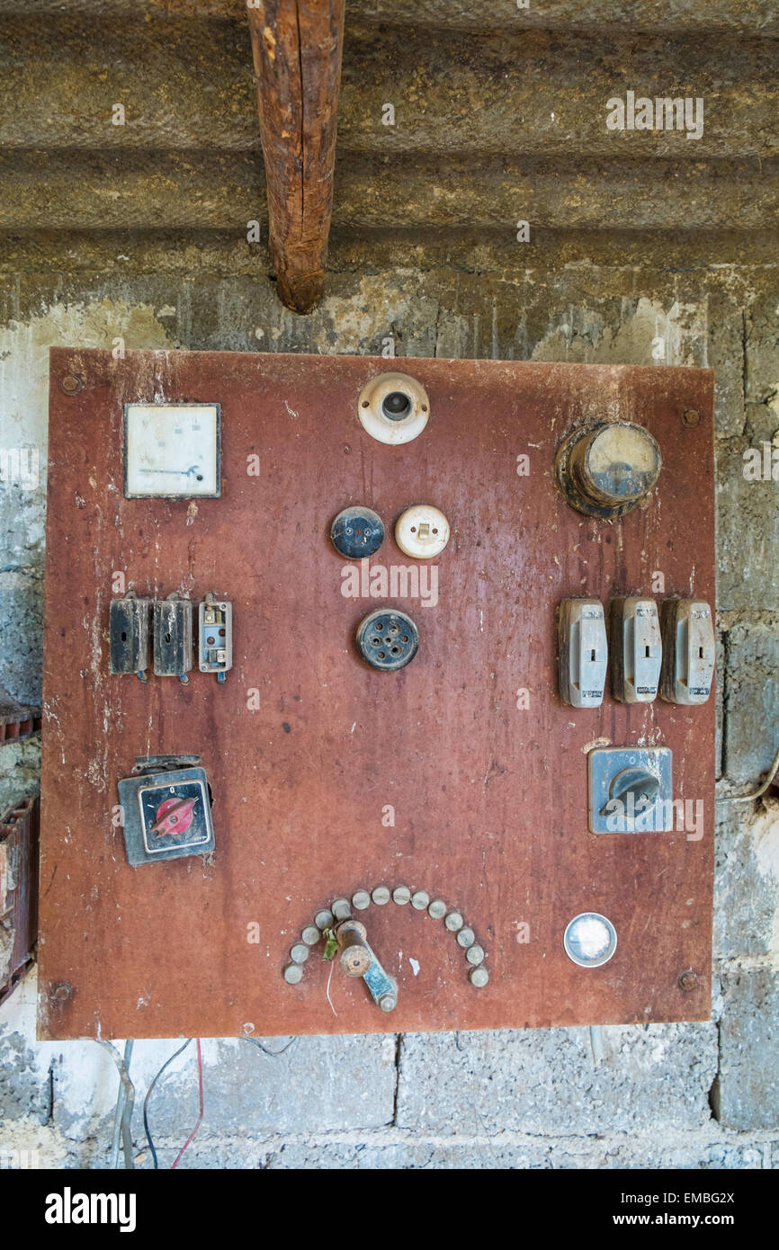 Vintage electrical switchboard with multiple controls, fuses and levers ...