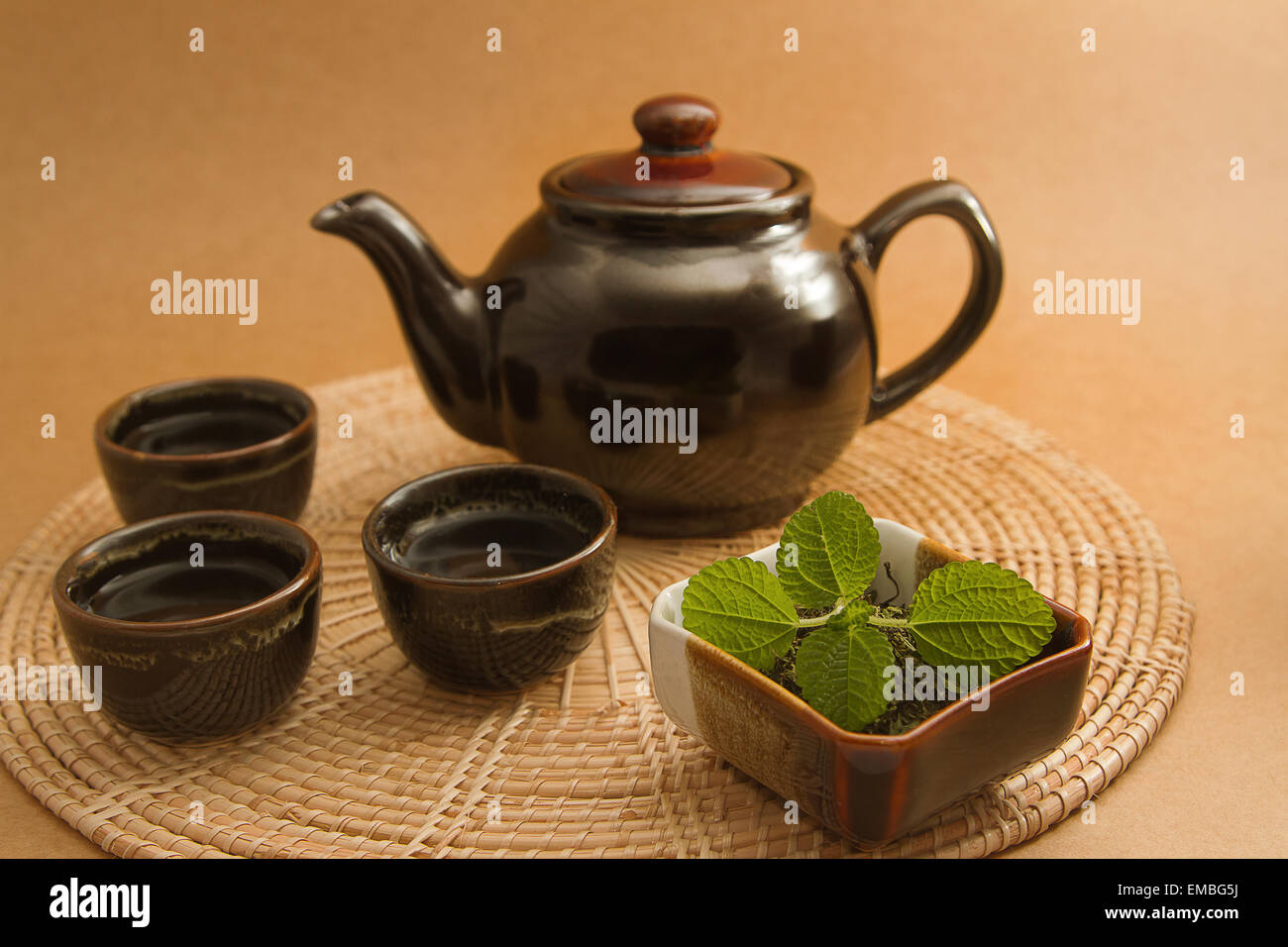 Tea leave in bowl with fresh mint and tea assortment Stock Photo - Alamy