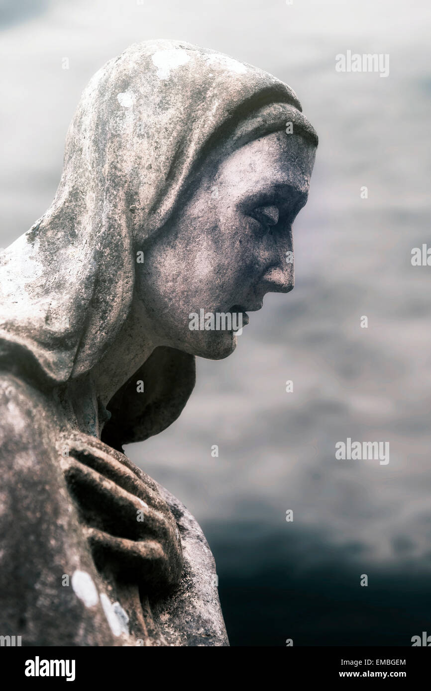 an old statue made out of stone Stock Photo - Alamy