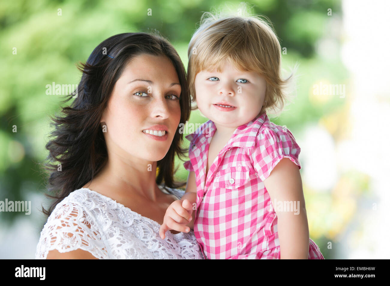 Mother with her beautiful daughter Stock Photo - Alamy