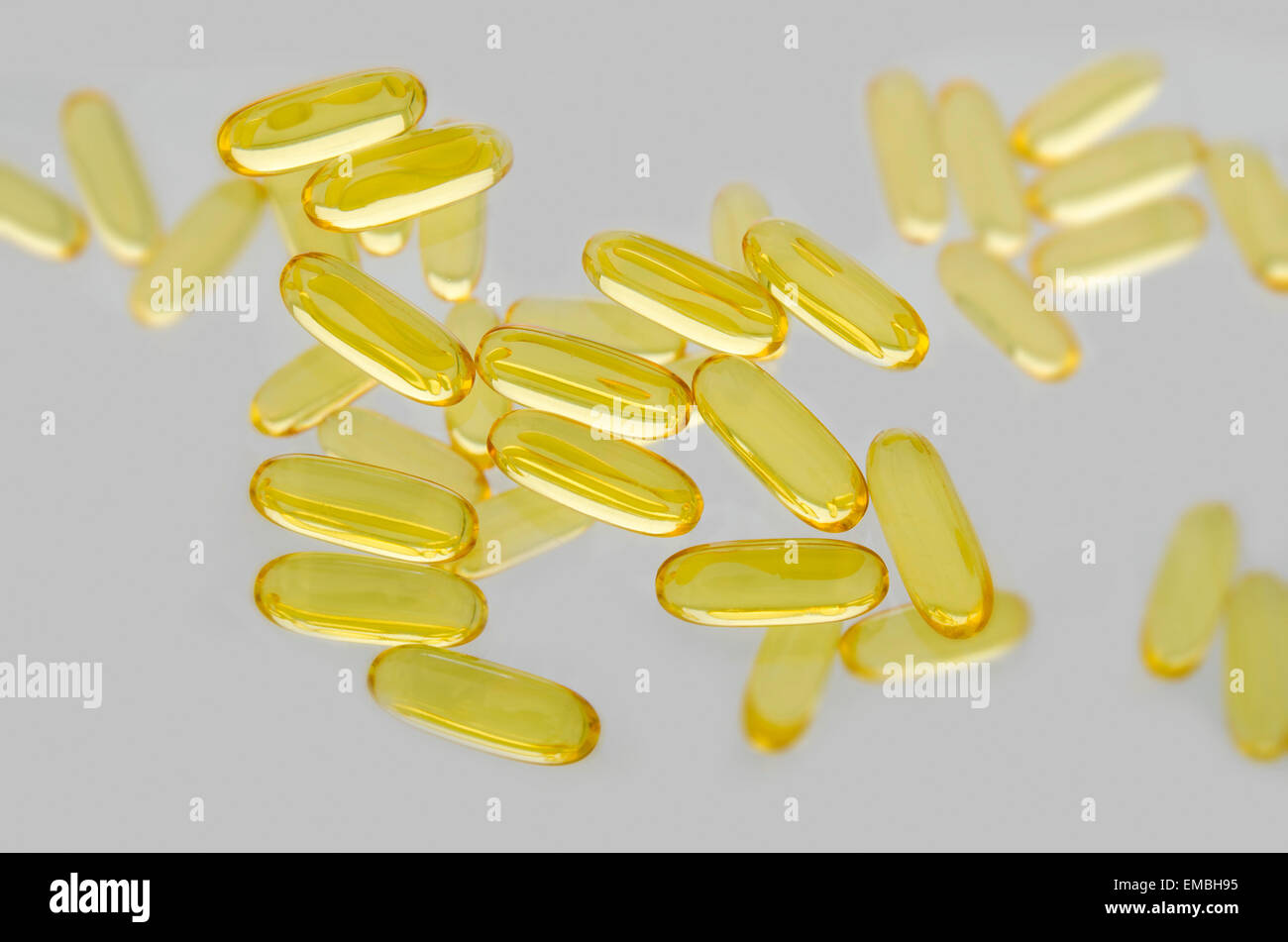 Pile of omega-3 fish fat oil capsules Stock Photo - Alamy