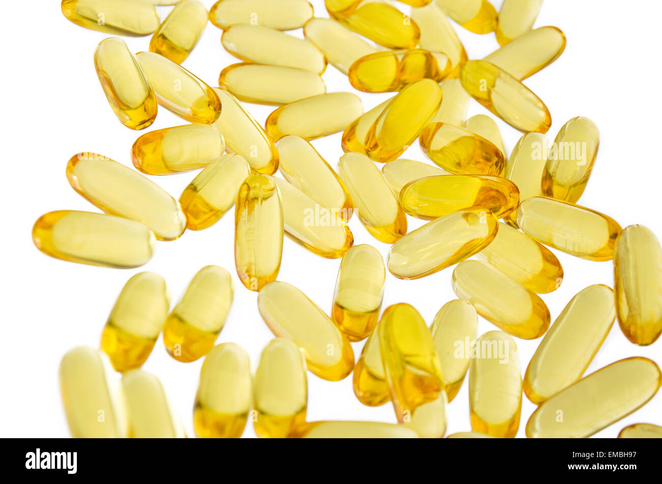 omega-3 fish fat oil capsules on white background Stock Photo - Alamy