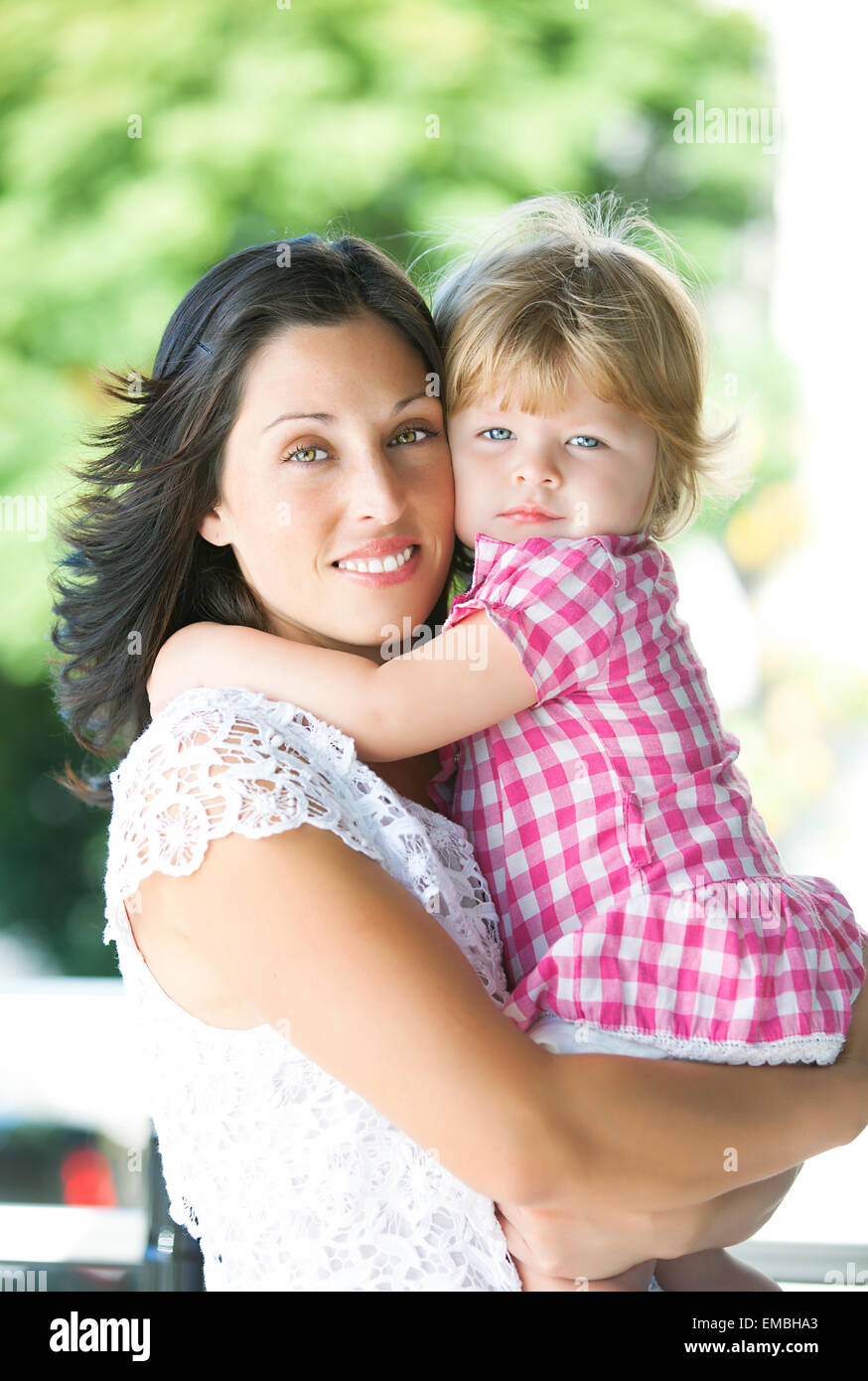 Mother with her beautiful daughter Stock Photo - Alamy
