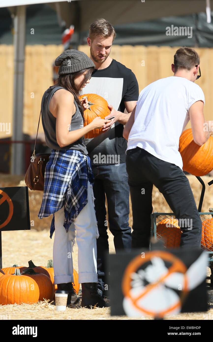 Calvin harris and his new girlfriend hi-res stock photography and ...