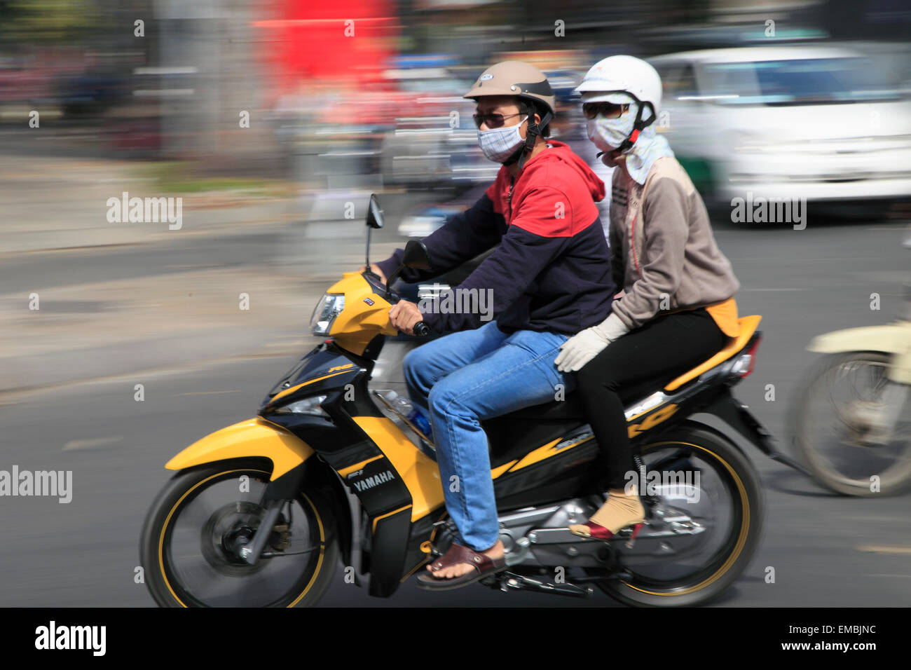 Vietnam, Ho Chi Minh City, Saigon, people on motorcycle Stock Photo - Alamy