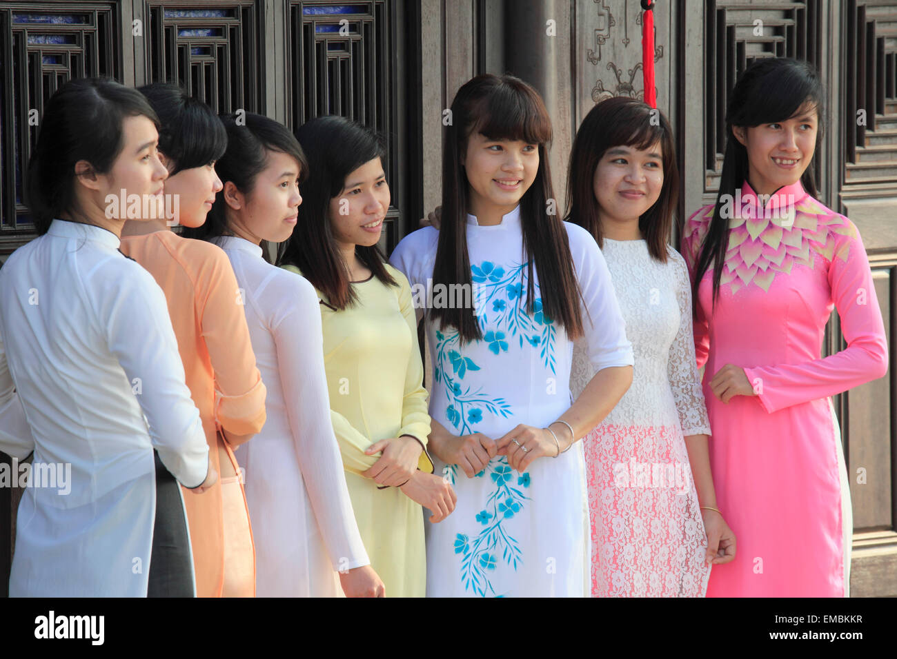 Vietnam, Hue, young women in traditional ao dai dress Stock Photo - Alamy