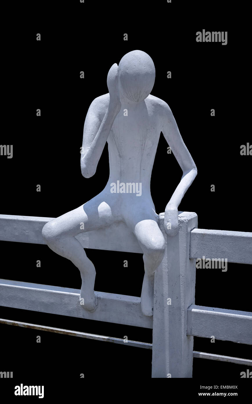 Statue of listening man. Figure of a person cupping the ear and ...