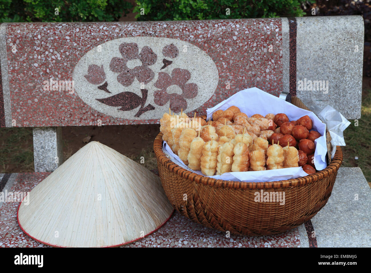 Vietnam, Hanoi, basket of street snacks Stock Photo - Alamy