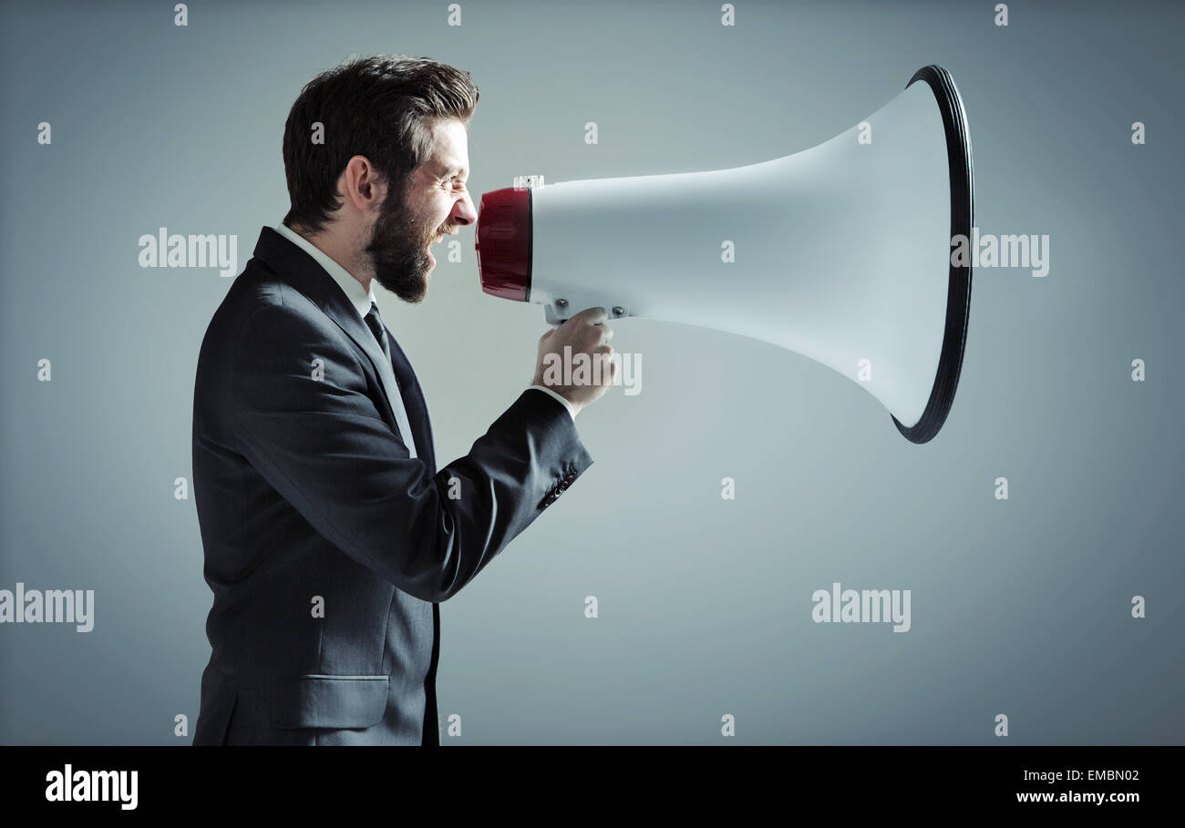 Conceptual photo of manager yelling over the megaphone Stock Photo - Alamy
