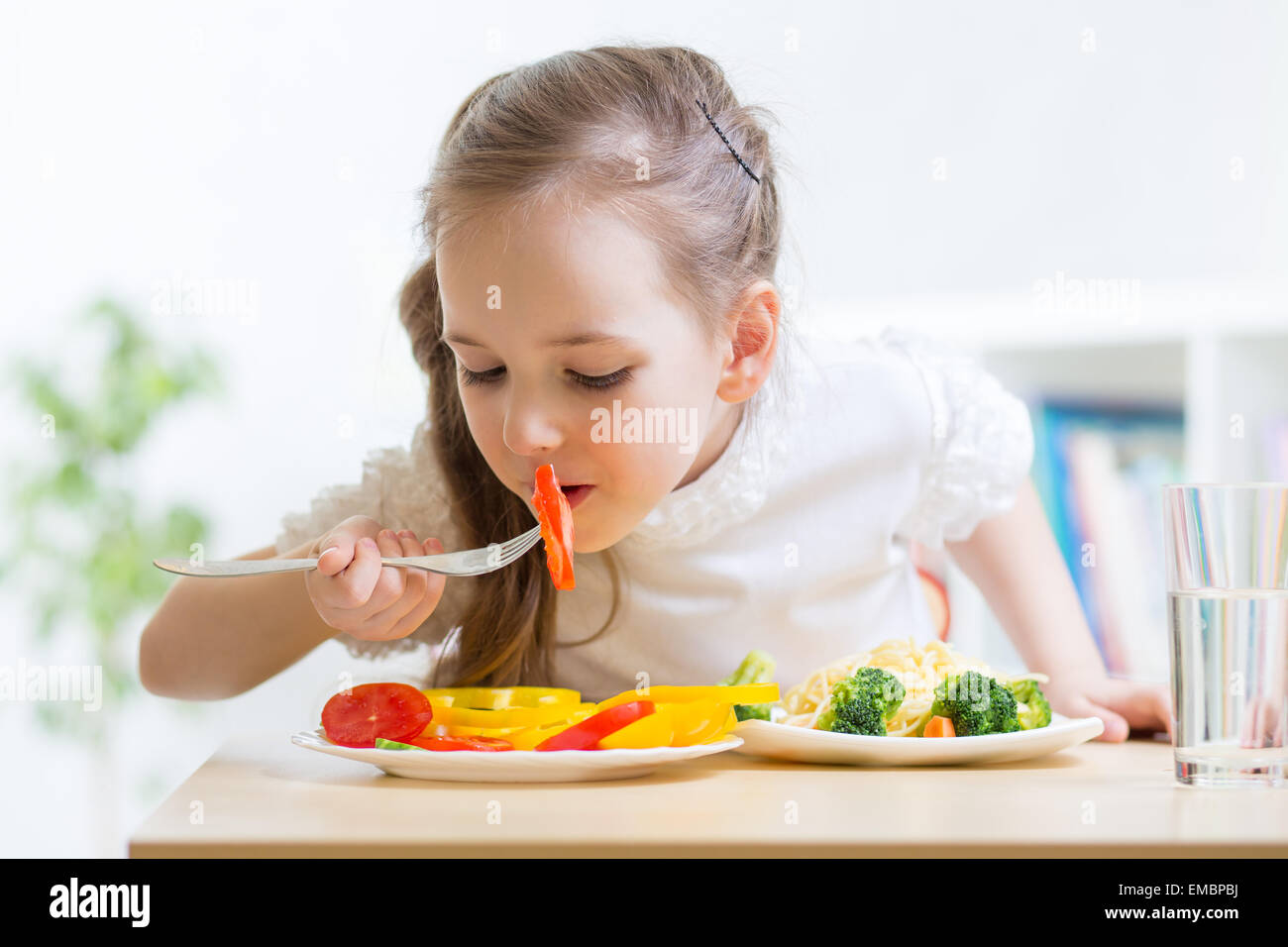 child eating healthy food at home Stock Photo - Alamy