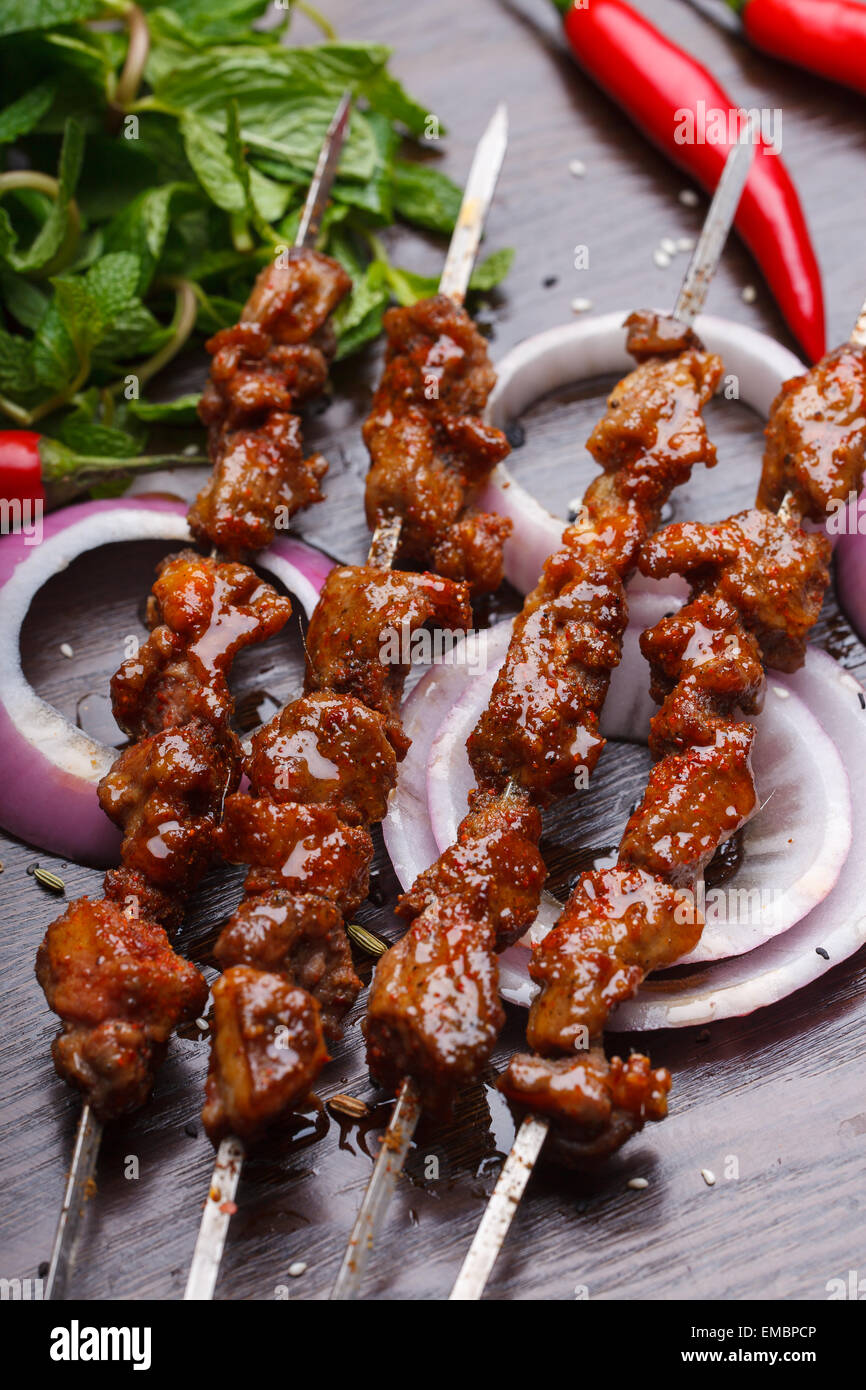 China Food, mutton cubes roasted on a skewer Stock Photo - Alamy