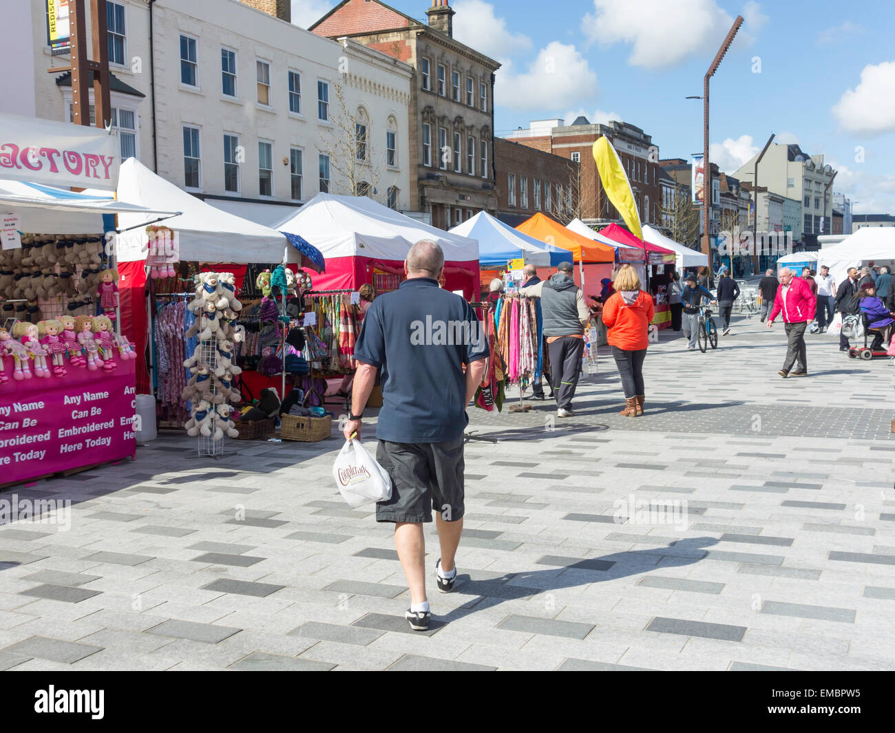 Shoppers at a Friday market in the revamped High Street in Stockton on ...