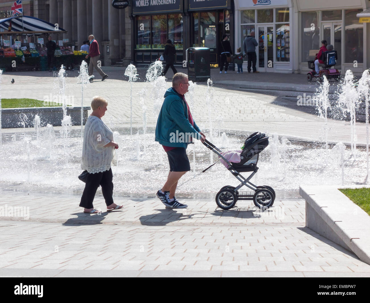 Man woman baby buggy walk hi-res stock photography and images - Alamy