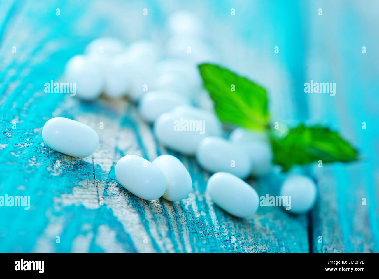 mint candy with mint leaf on a table Stock Photo - Alamy