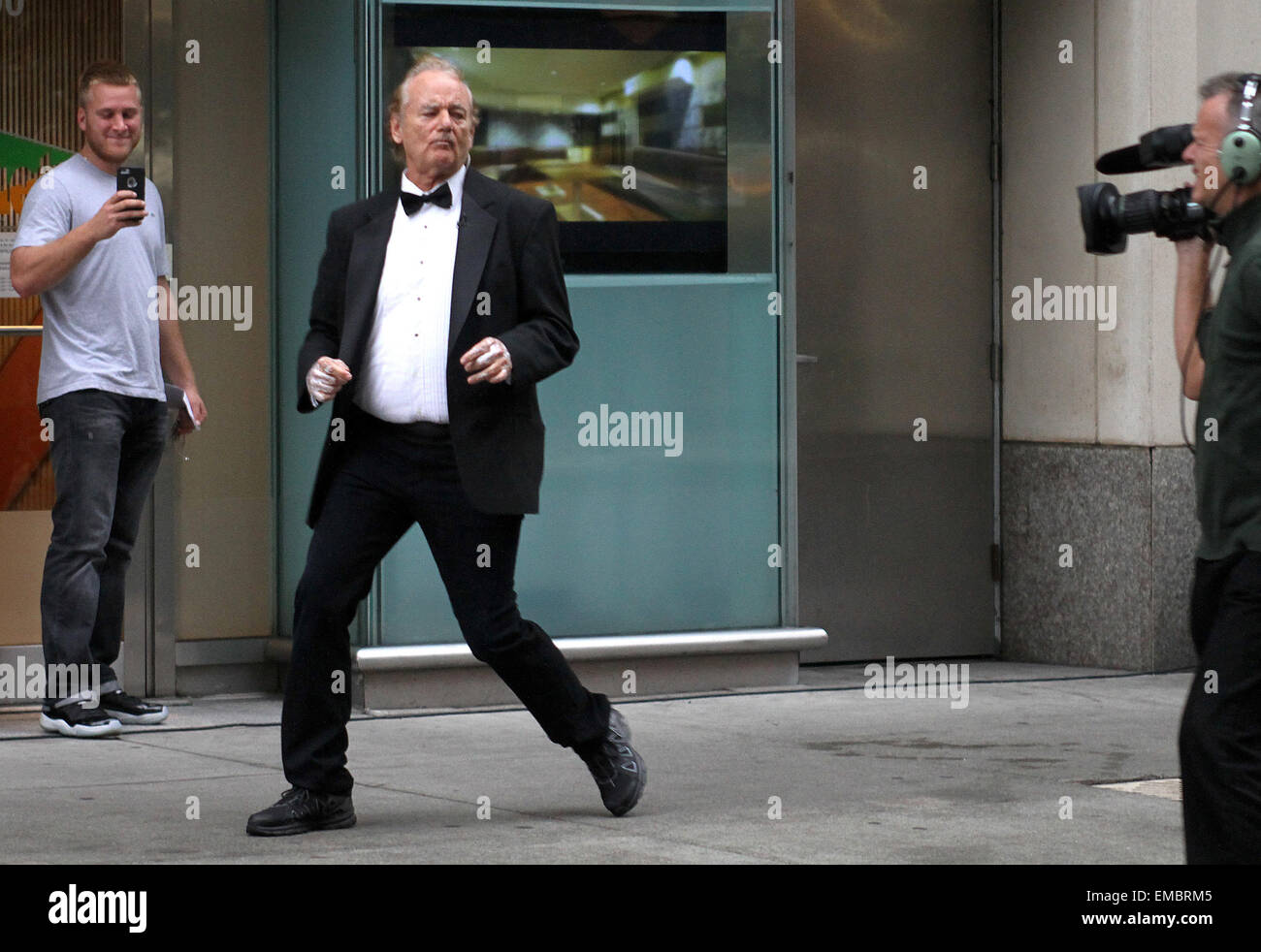 Bill Murray runs along New York's 53rd street in a skit for the 'Late ...