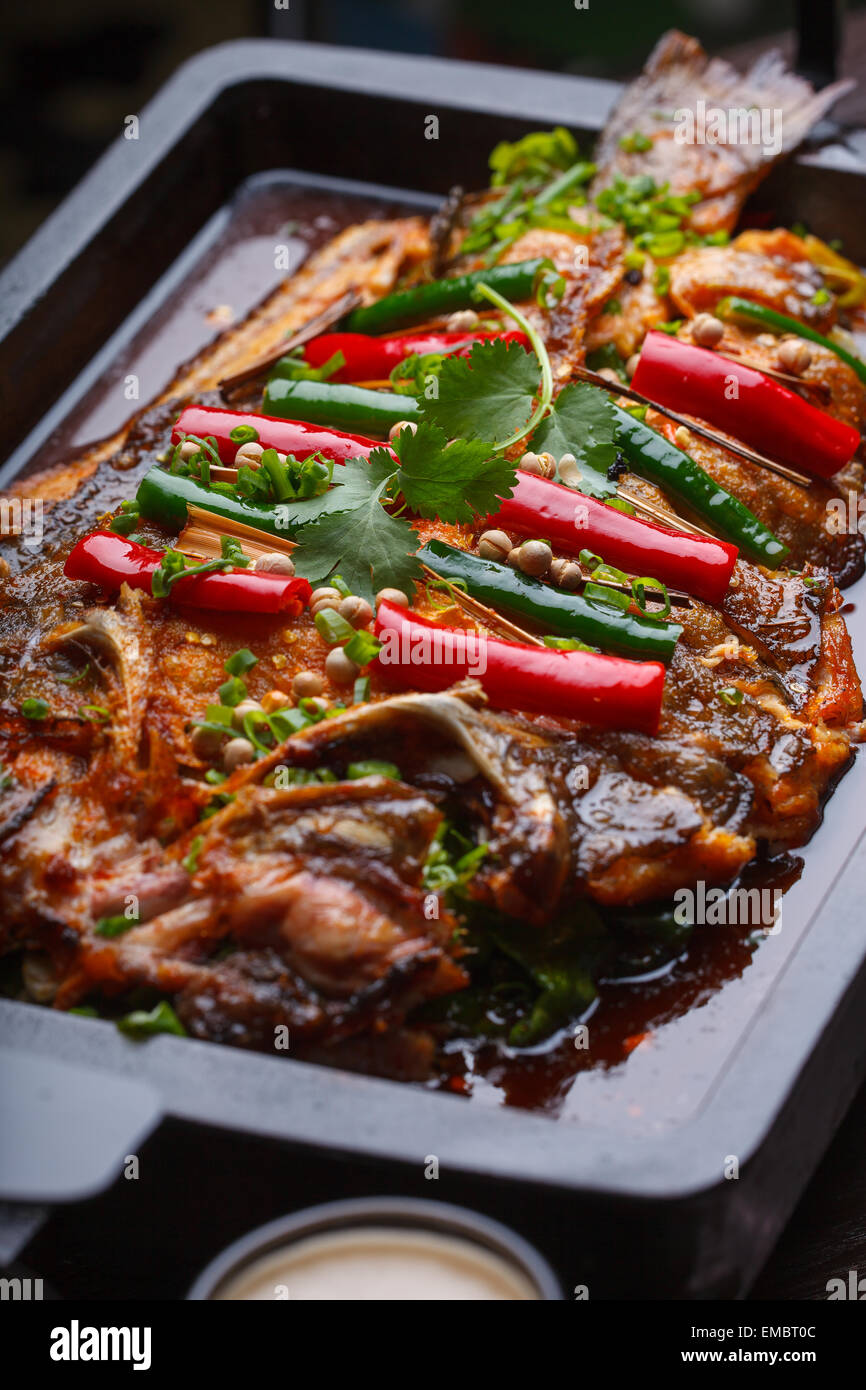 Chinese style grilled fish, Sichuan flavor Stock Photo - Alamy