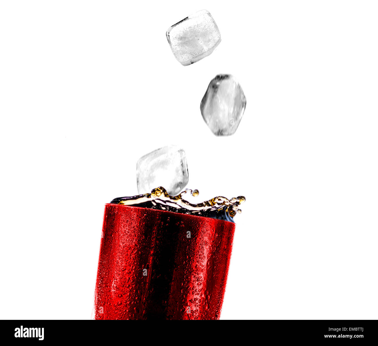 Cola drink splash in red bottle cube on white background Stock Photo ...