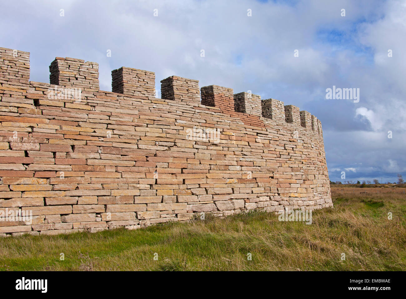 Defensive dry stone wall with crenellation of the Eketorp Castle, Iron ...