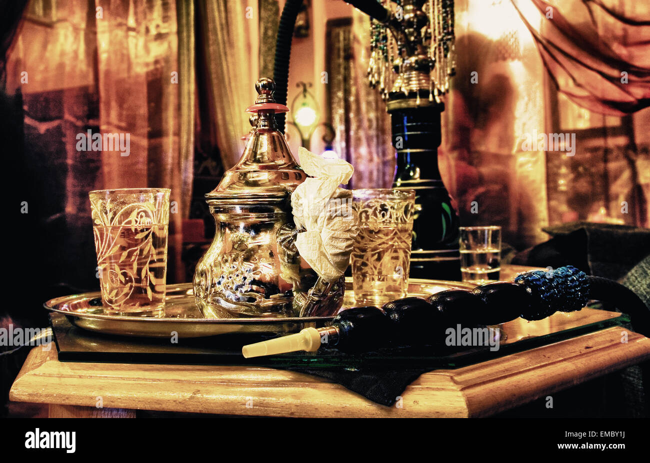 Arabic water pipe with tea set in beautiful arabic decor at Granada ...