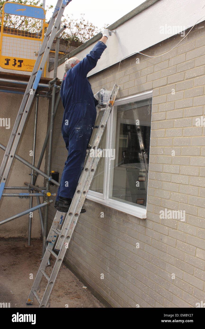 Working from ladders hi-res stock photography and images - Alamy