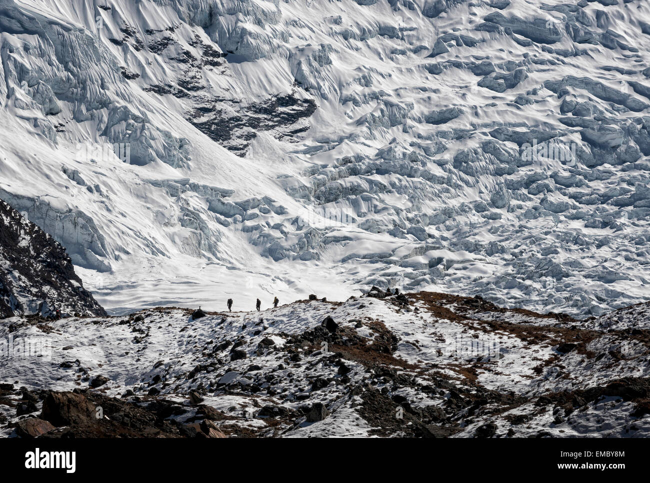 Nepal, Khumbu, Everest region, trekkers above dingboche, Lhotse and ...