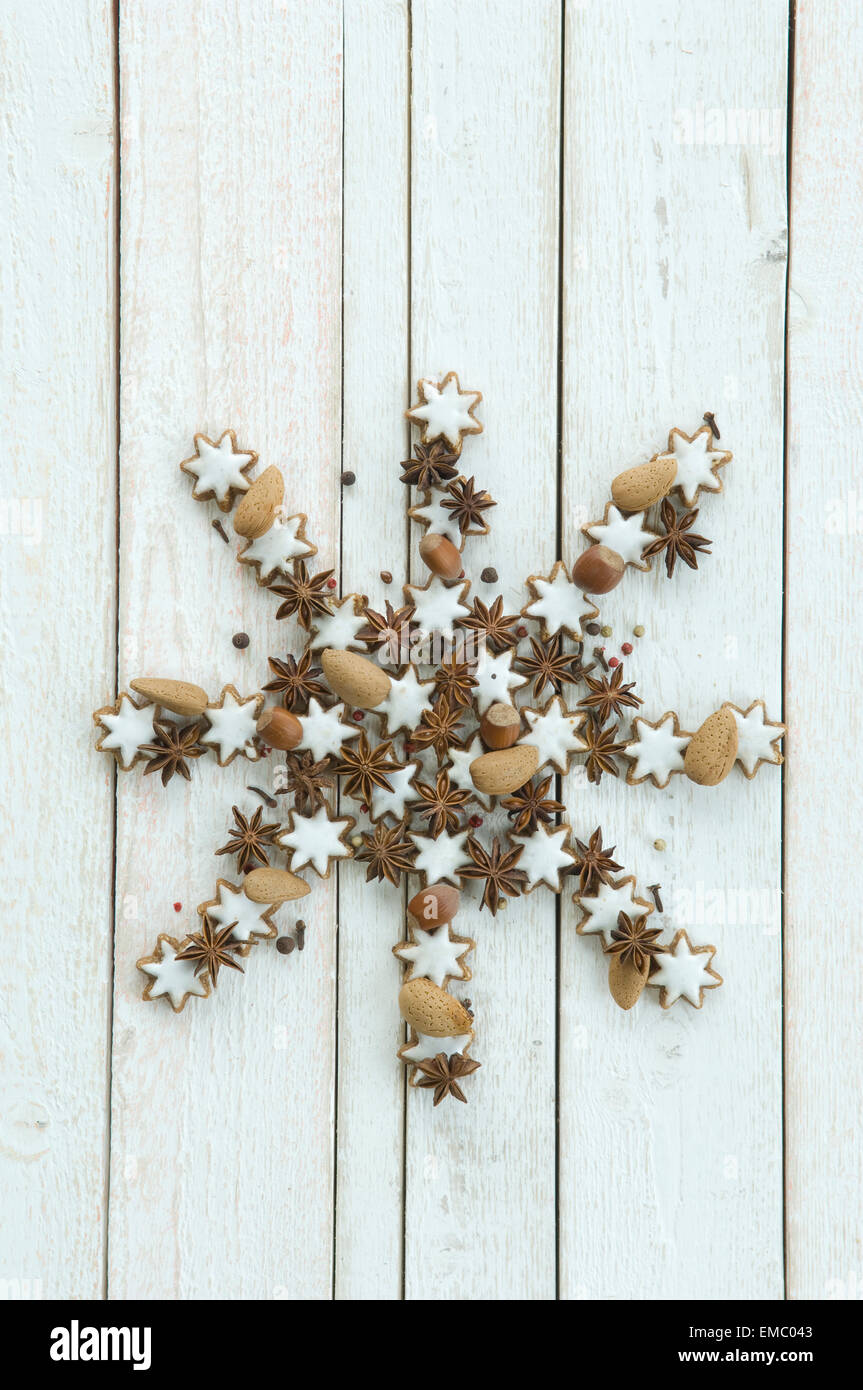 Star shaped of cinnamon stars, almonds, hazelnuts and star anise Stock ...