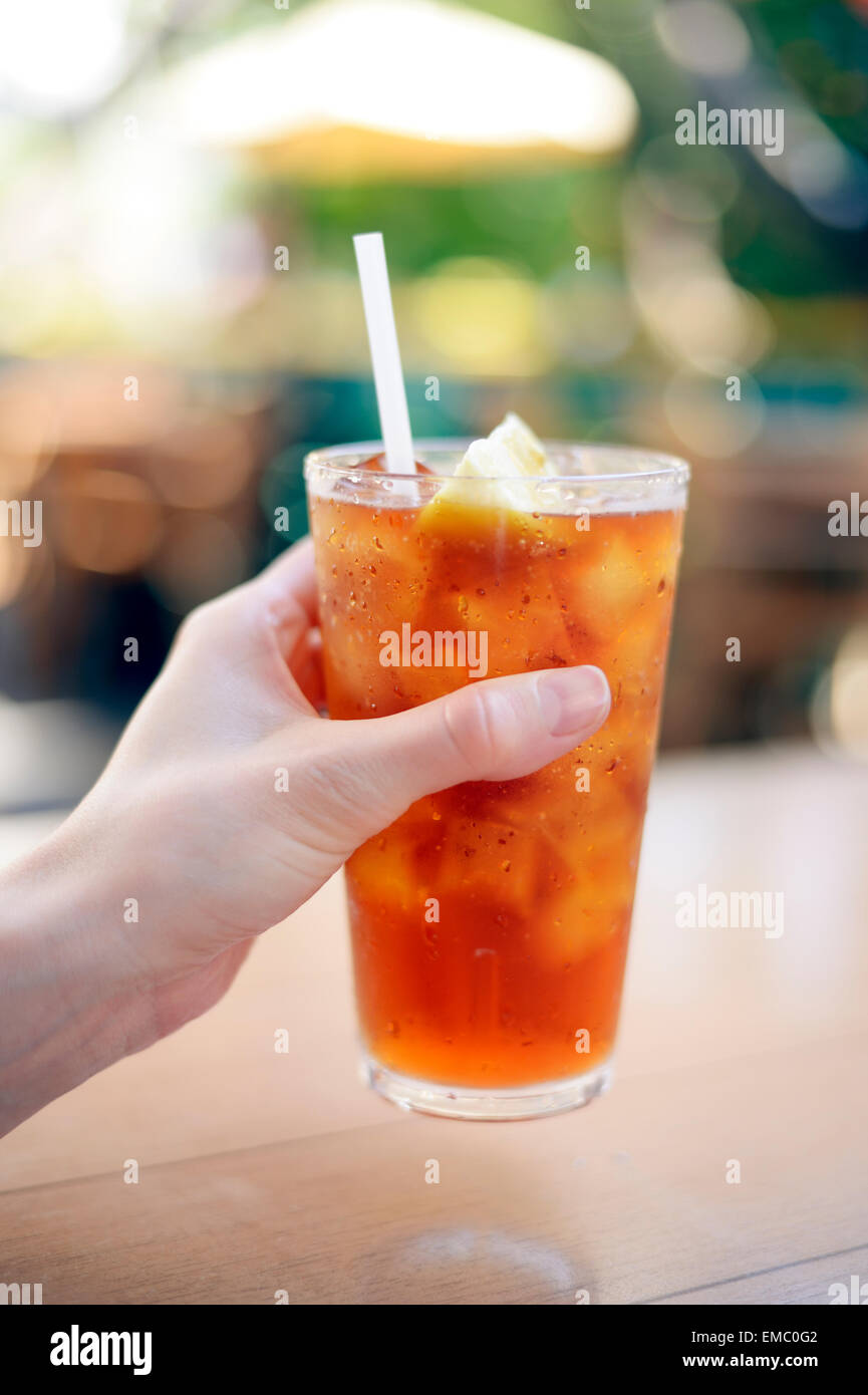 Hand on iced lemon hi-res stock photography and images - Alamy