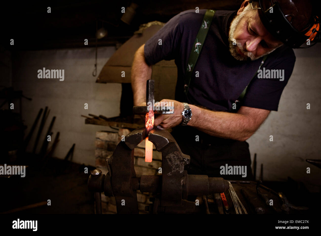 Blacksmith at work Stock Photo - Alamy