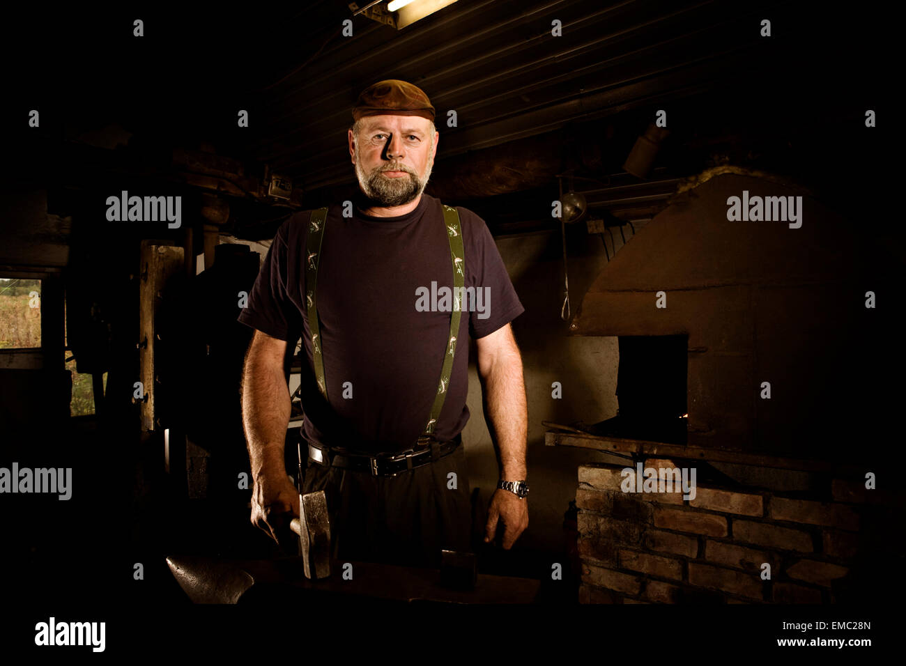 Portrait of blacksmith in his workshop Stock Photo - Alamy