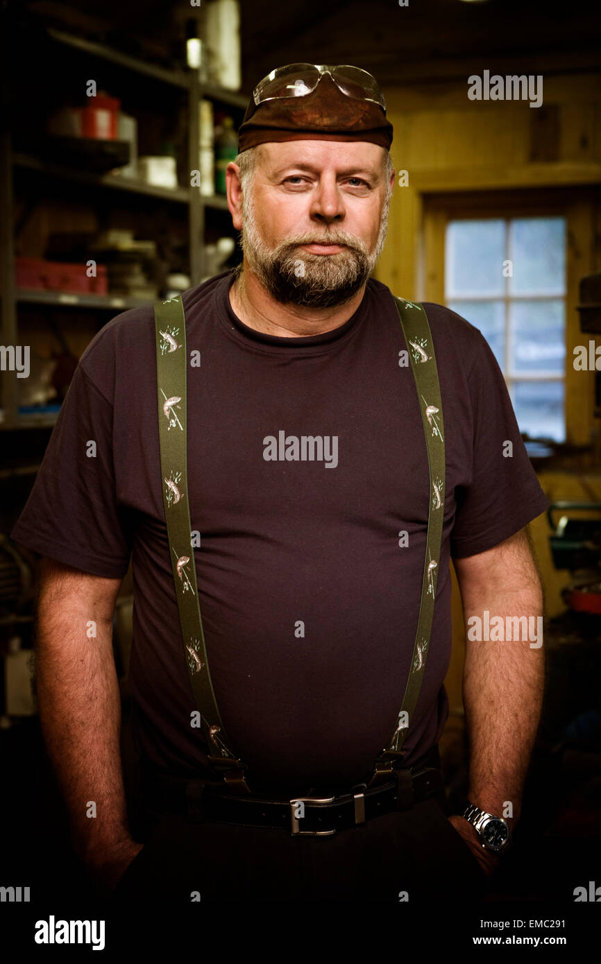 Portrait of craftsman in his workshop Stock Photo - Alamy