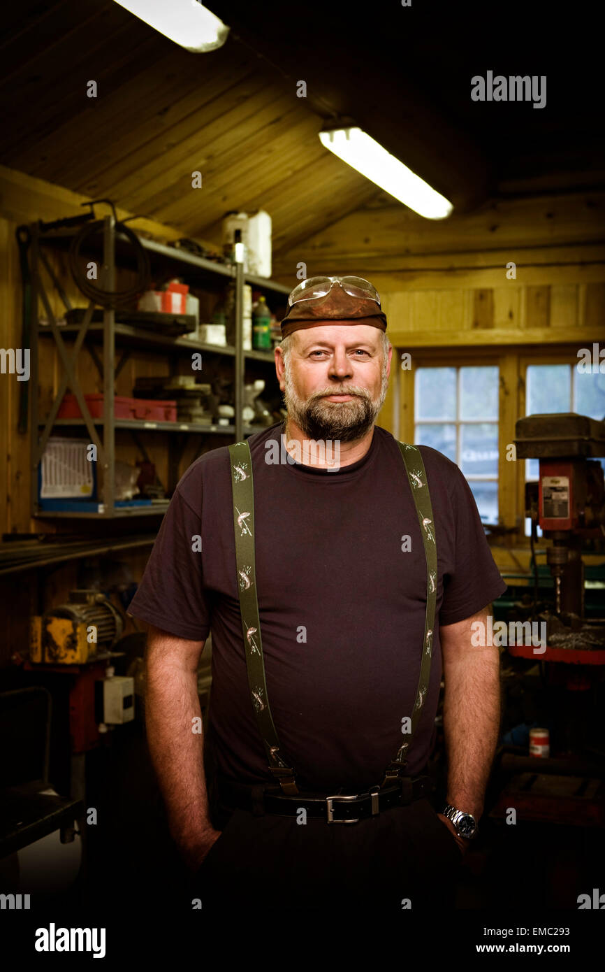 Portrait of craftsman in his workshop Stock Photo - Alamy