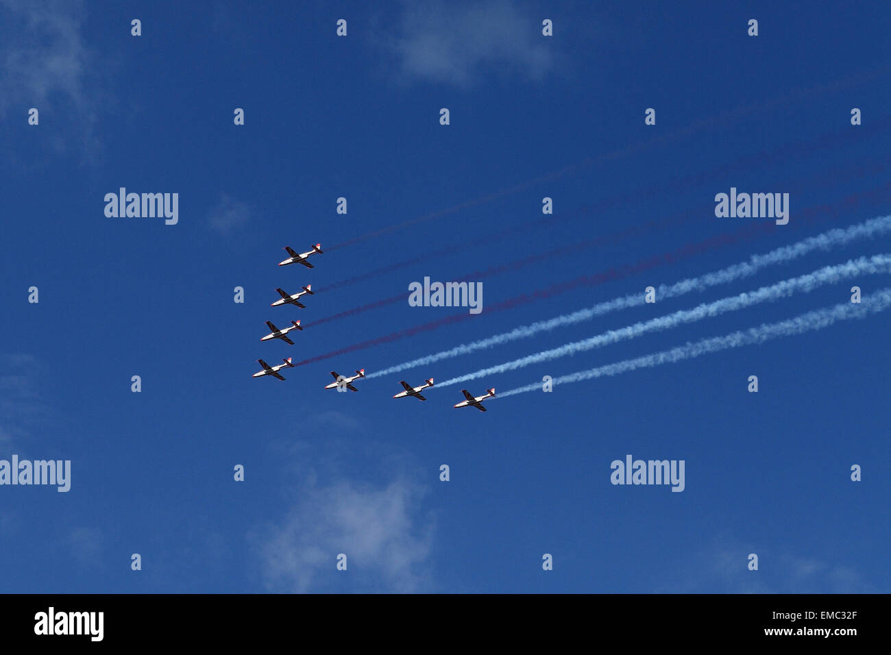 Squadron of seven airplanes in the air against blue sky Stock Photo - Alamy
