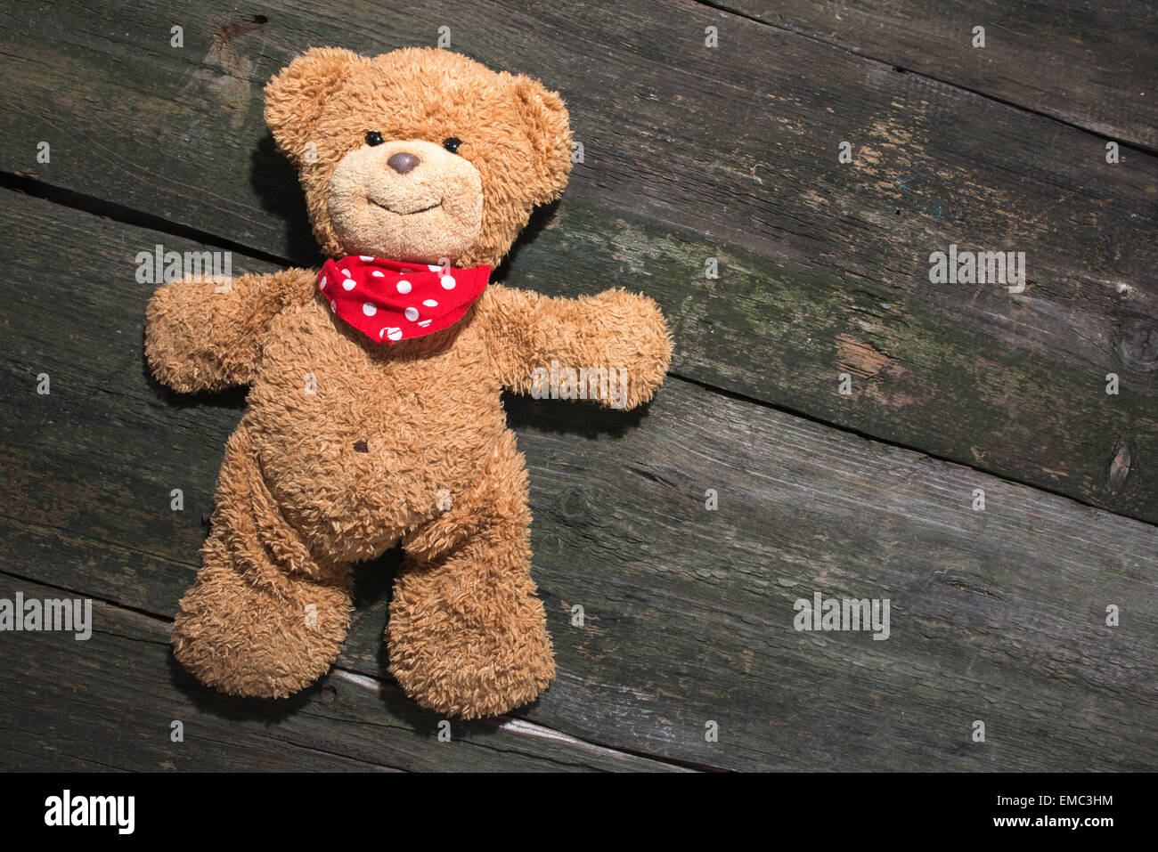 Teddy-bear on wooden background Stock Photo - Alamy