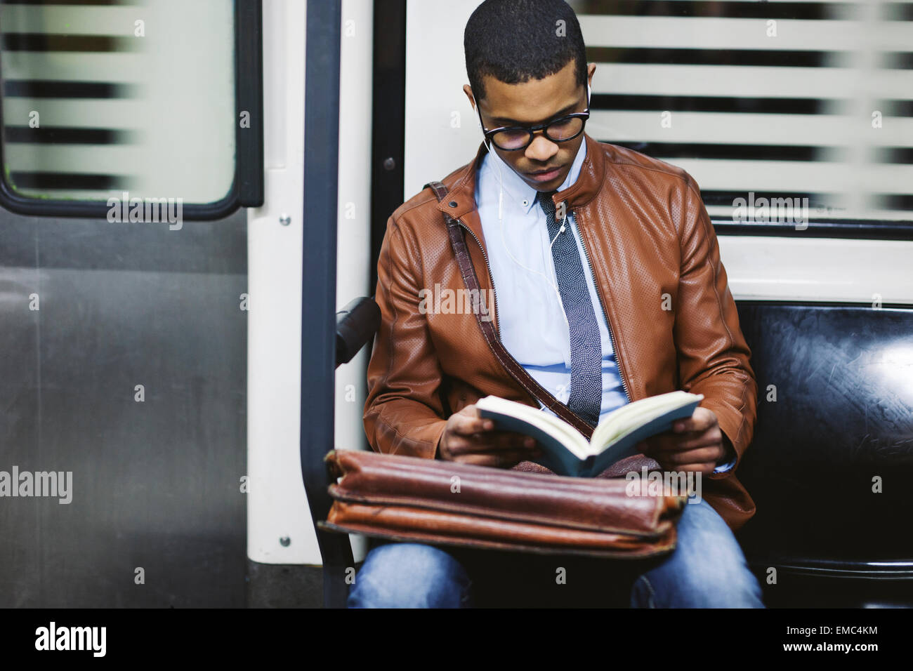 Train and book hi-res stock photography and images - Alamy