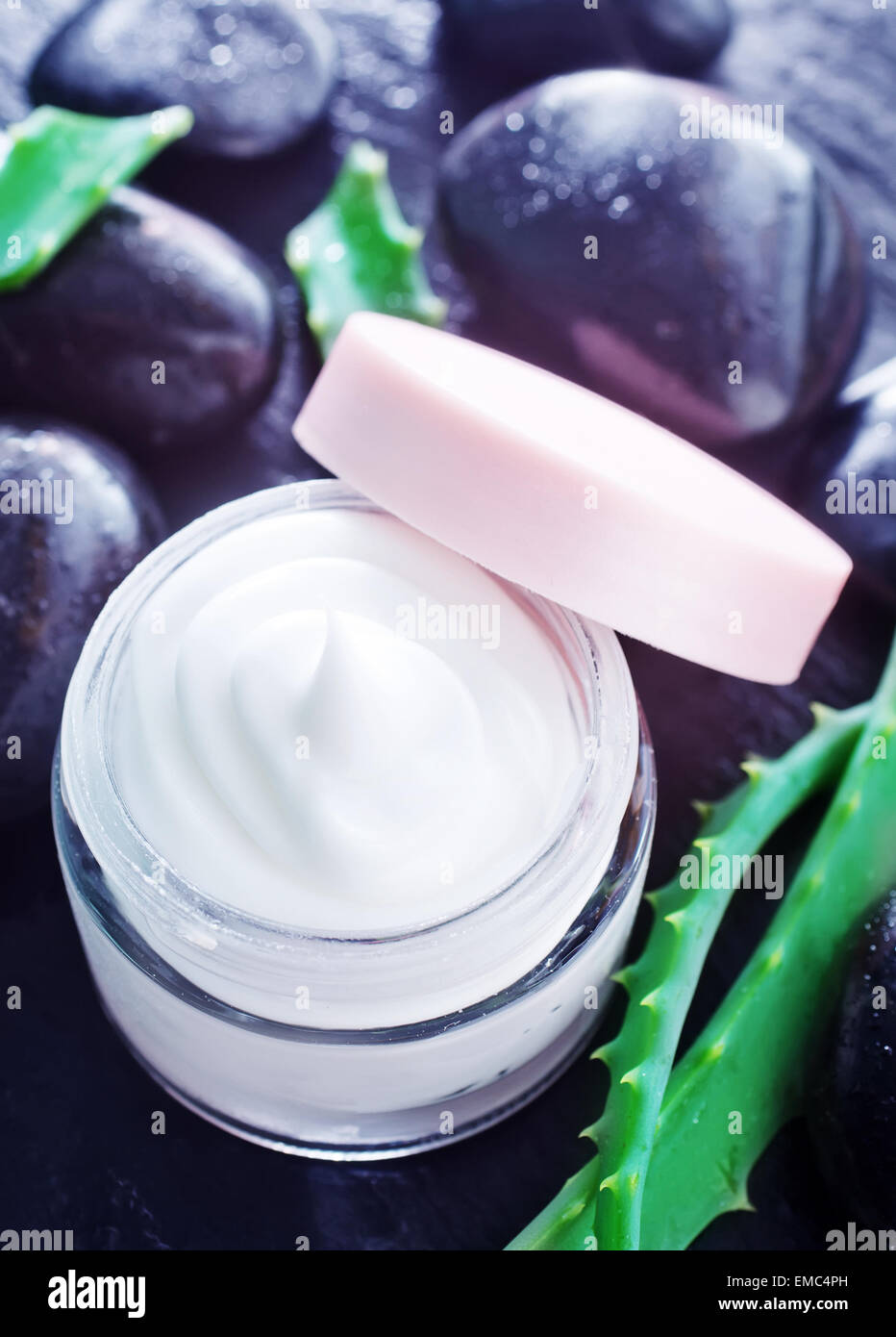 cosmetic cream in glass bank and on a table Stock Photo - Alamy