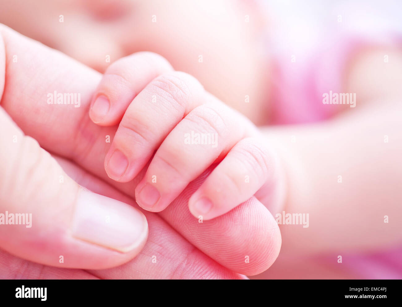 baby hand in mother hand, newborn hand Stock Photo - Alamy