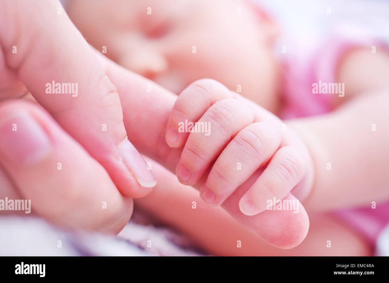 baby hand in mother hand, newborn hand Stock Photo - Alamy