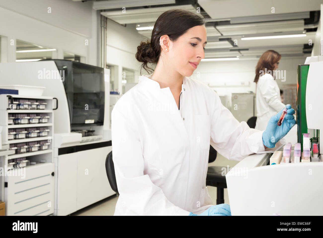 Scientists working in dark laboratory hi-res stock photography and ...