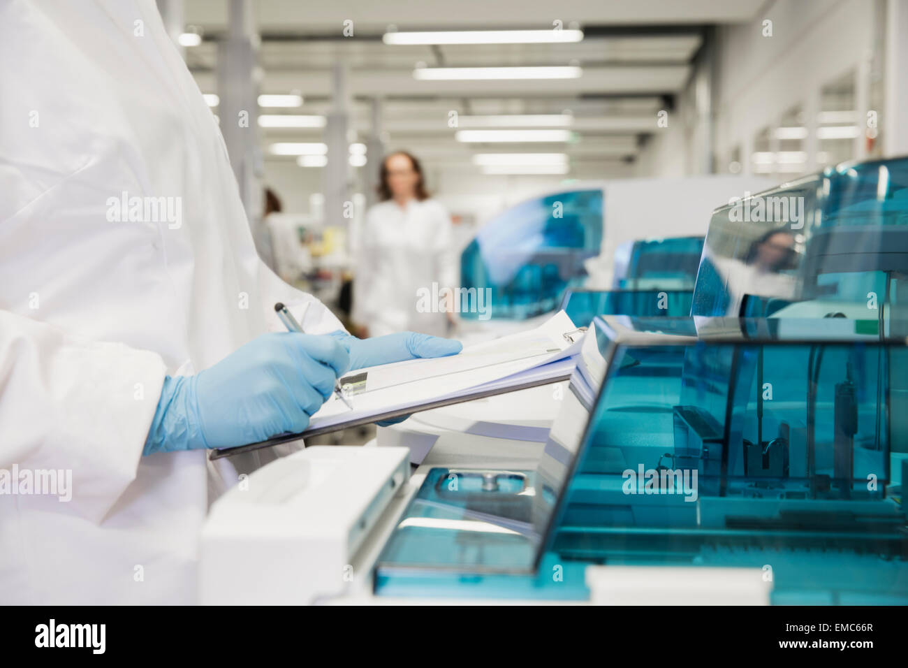 Scientists working in laboratory Stock Photo - Alamy