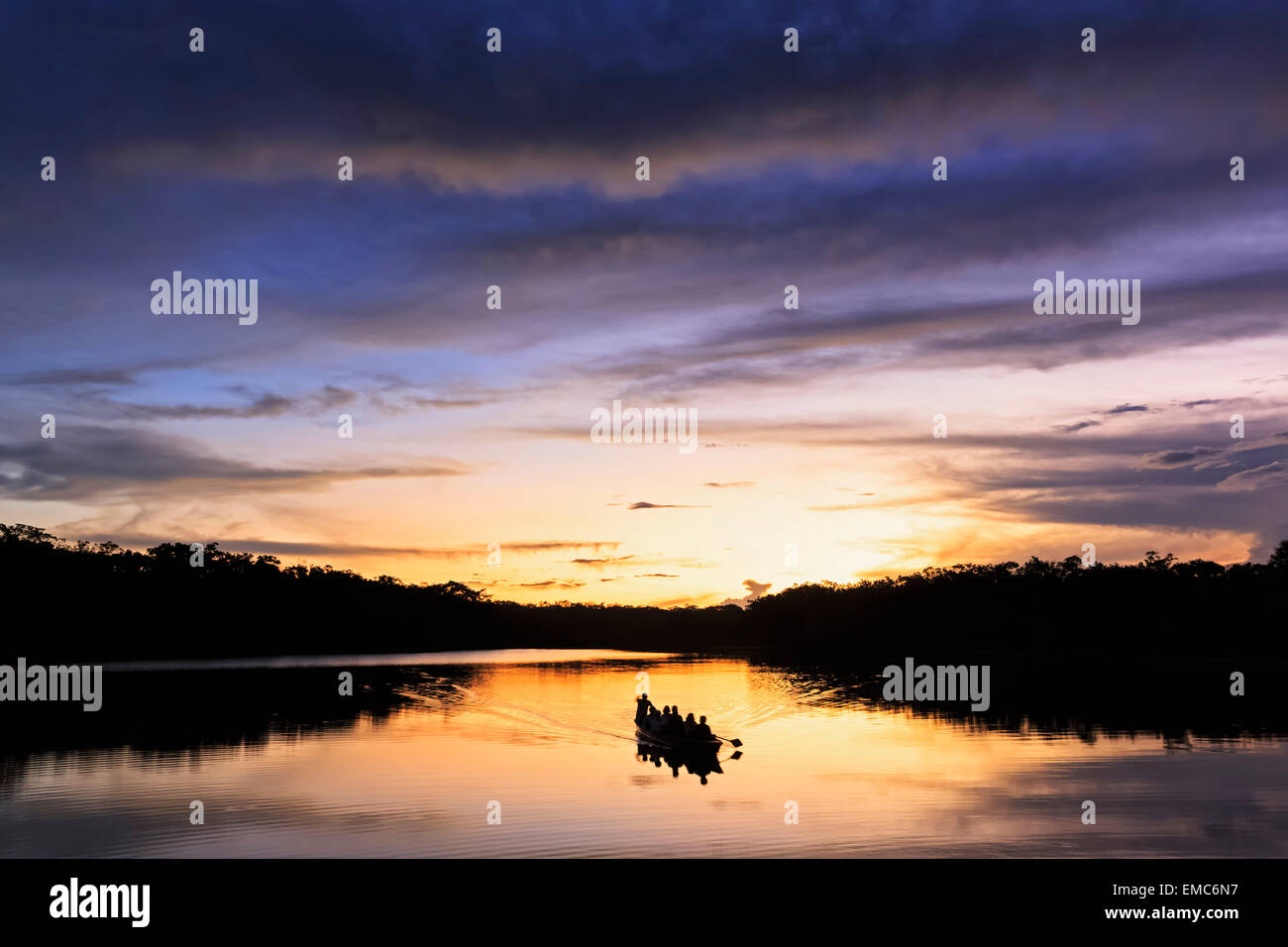Ecuador, Amazon River region, dugout canoe on Lake Pilchicocha at ...