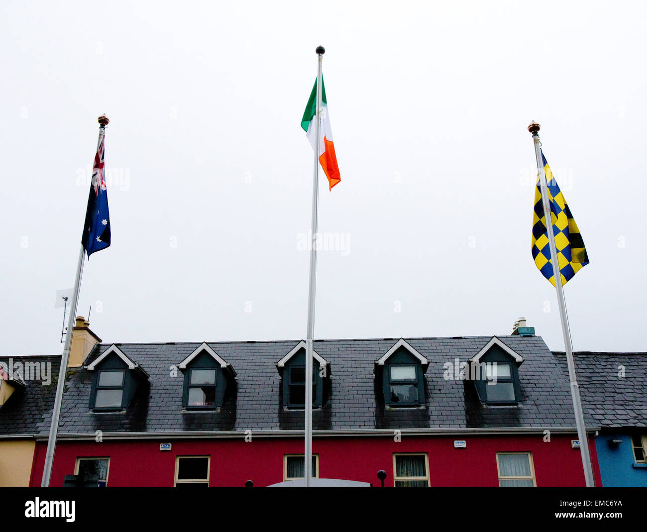 Irish, Australian and Clare flag on pole Stock Photo - Alamy