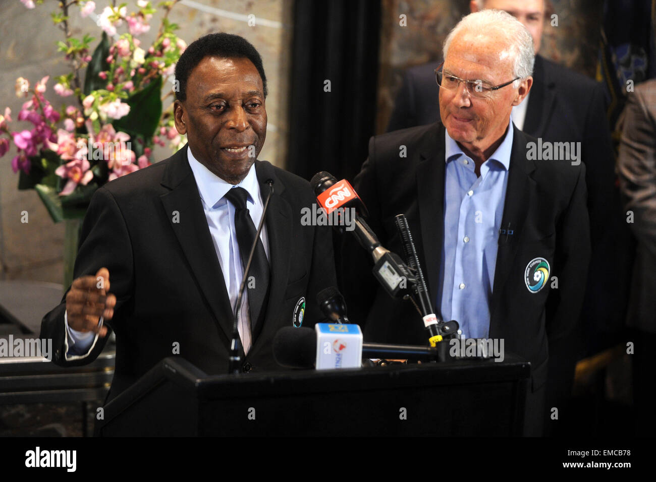 The New York Cosmos legends Pele and Franz Beckenbauer light the ...