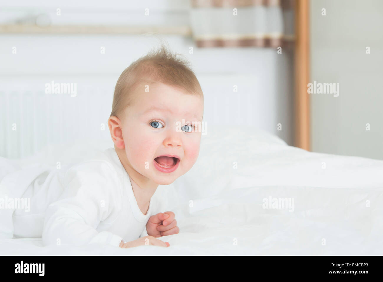 Excited baby girl Stock Photo - Alamy