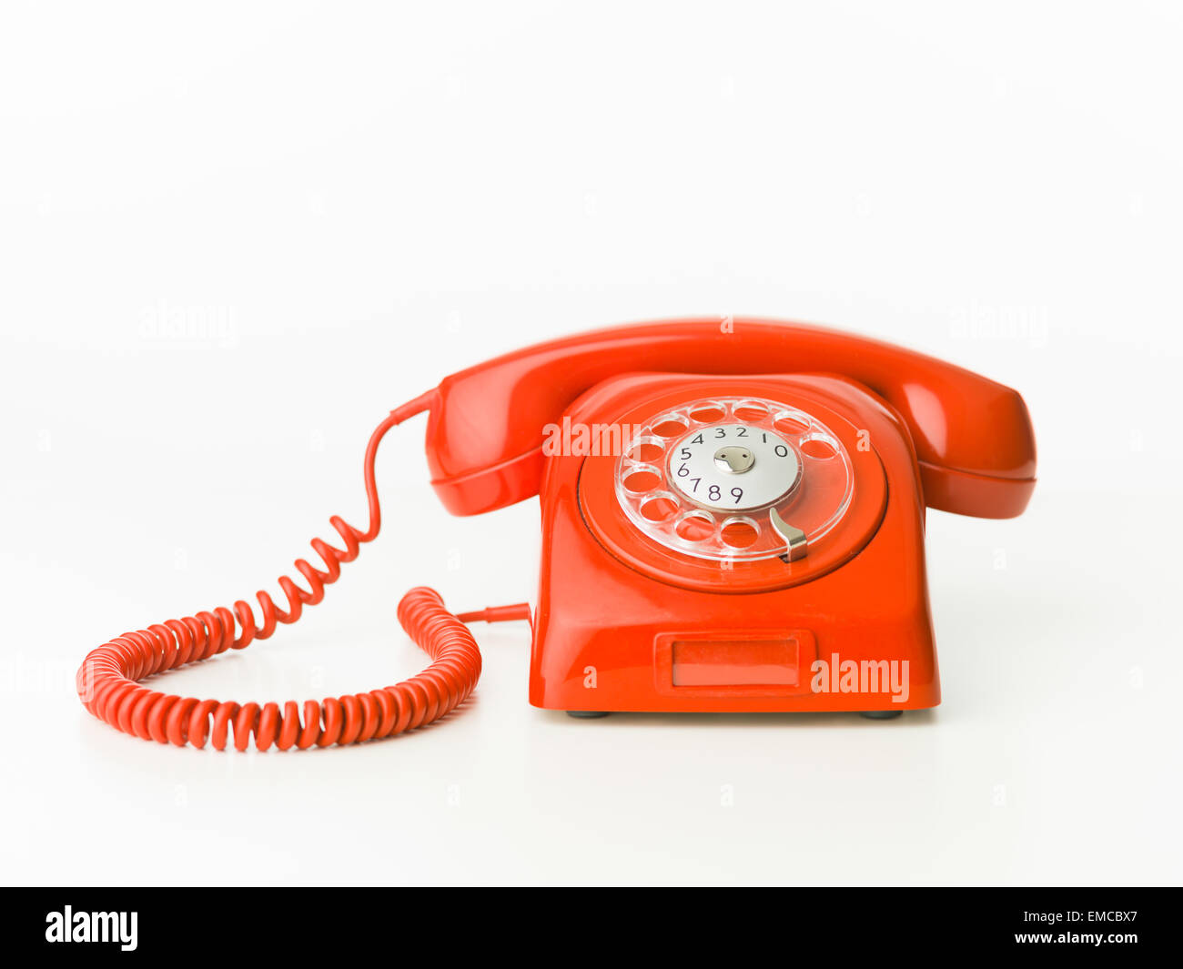 vintage red phone isolated on white background. copy space available ...