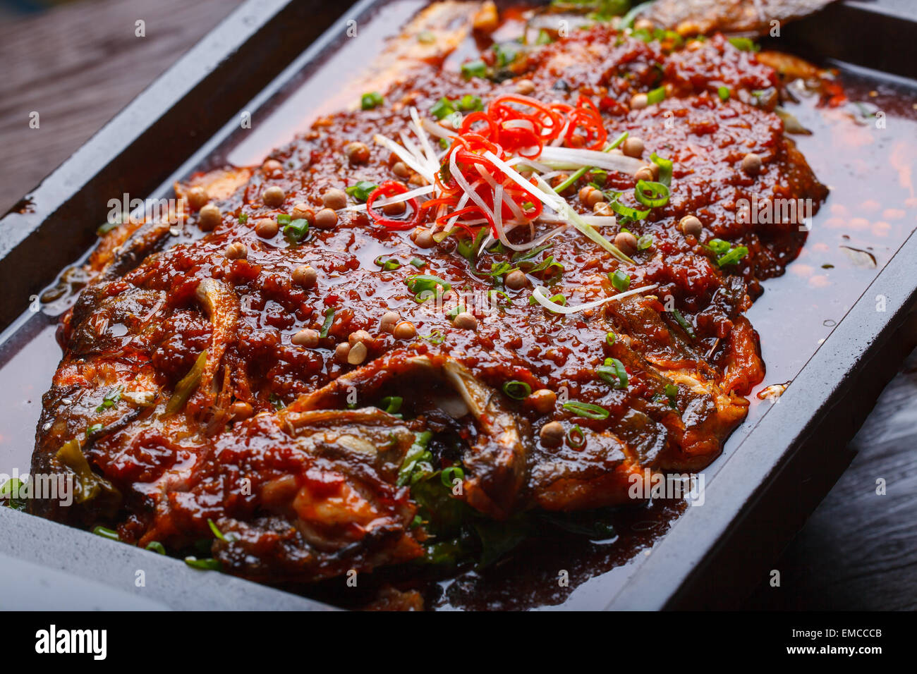 Chinese style grilled fish, Sichuan flavor Stock Photo - Alamy