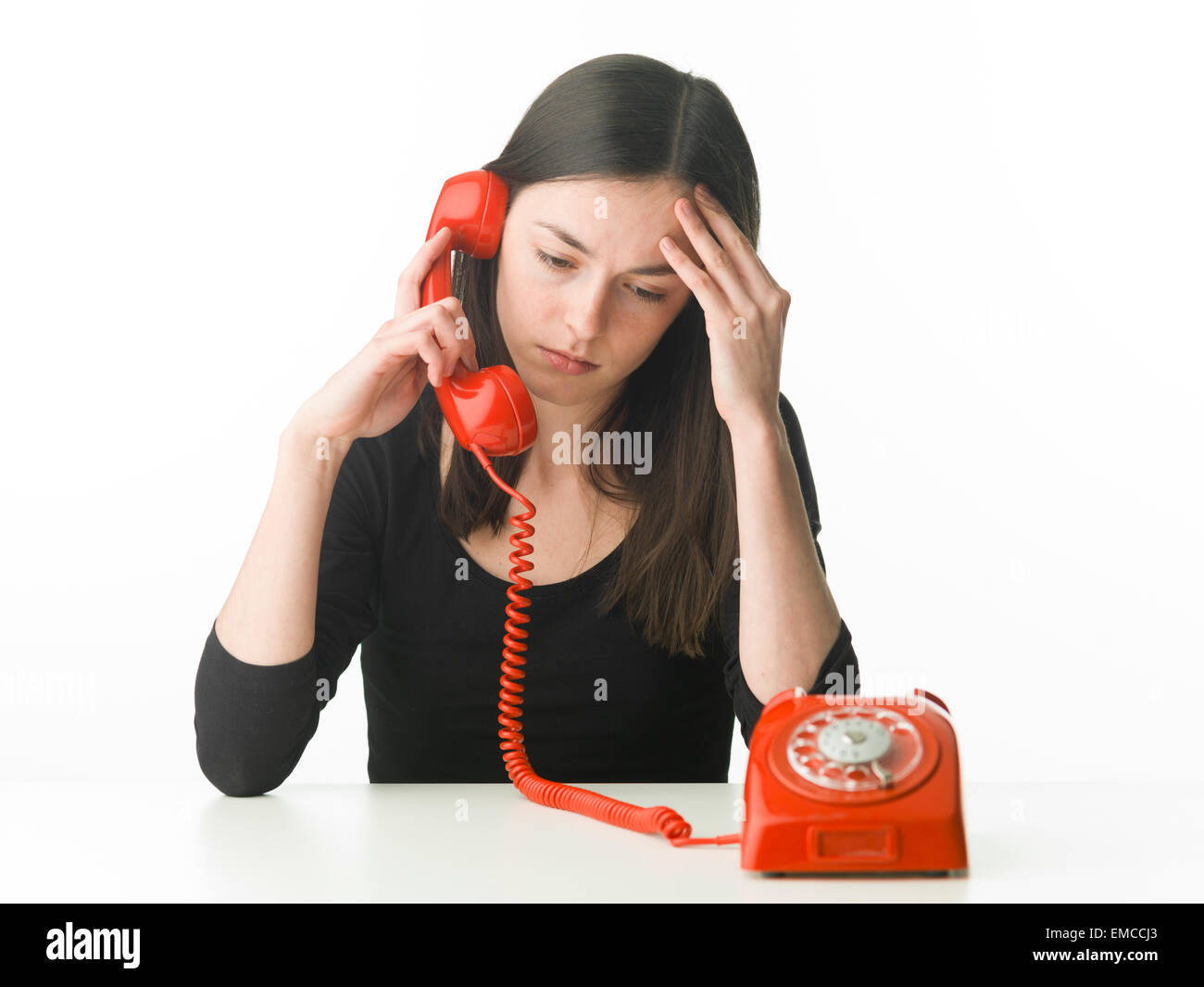 sad woman talking on the phone Stock Photo - Alamy