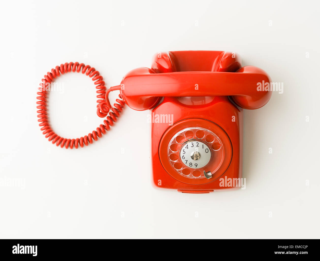 top view of red vintage phone on white background Stock Photo - Alamy