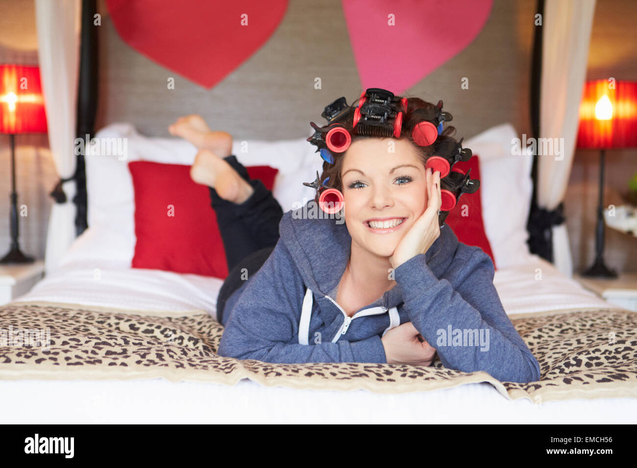 Bride Getting Ready For Wedding With Hair In Curlers Stock Photo - Alamy