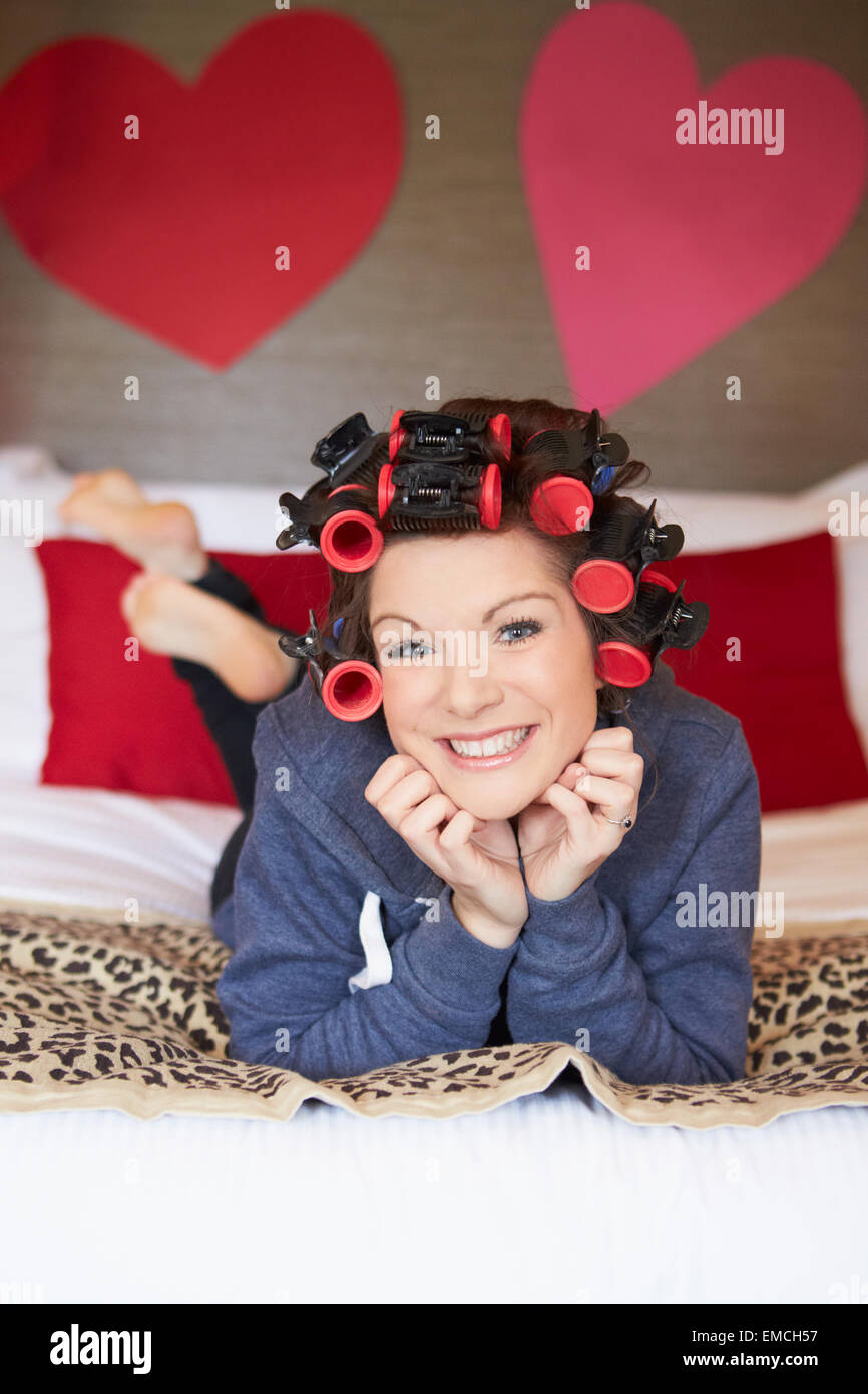 Bride Getting Ready For Wedding With Hair In Curlers Stock Photo - Alamy