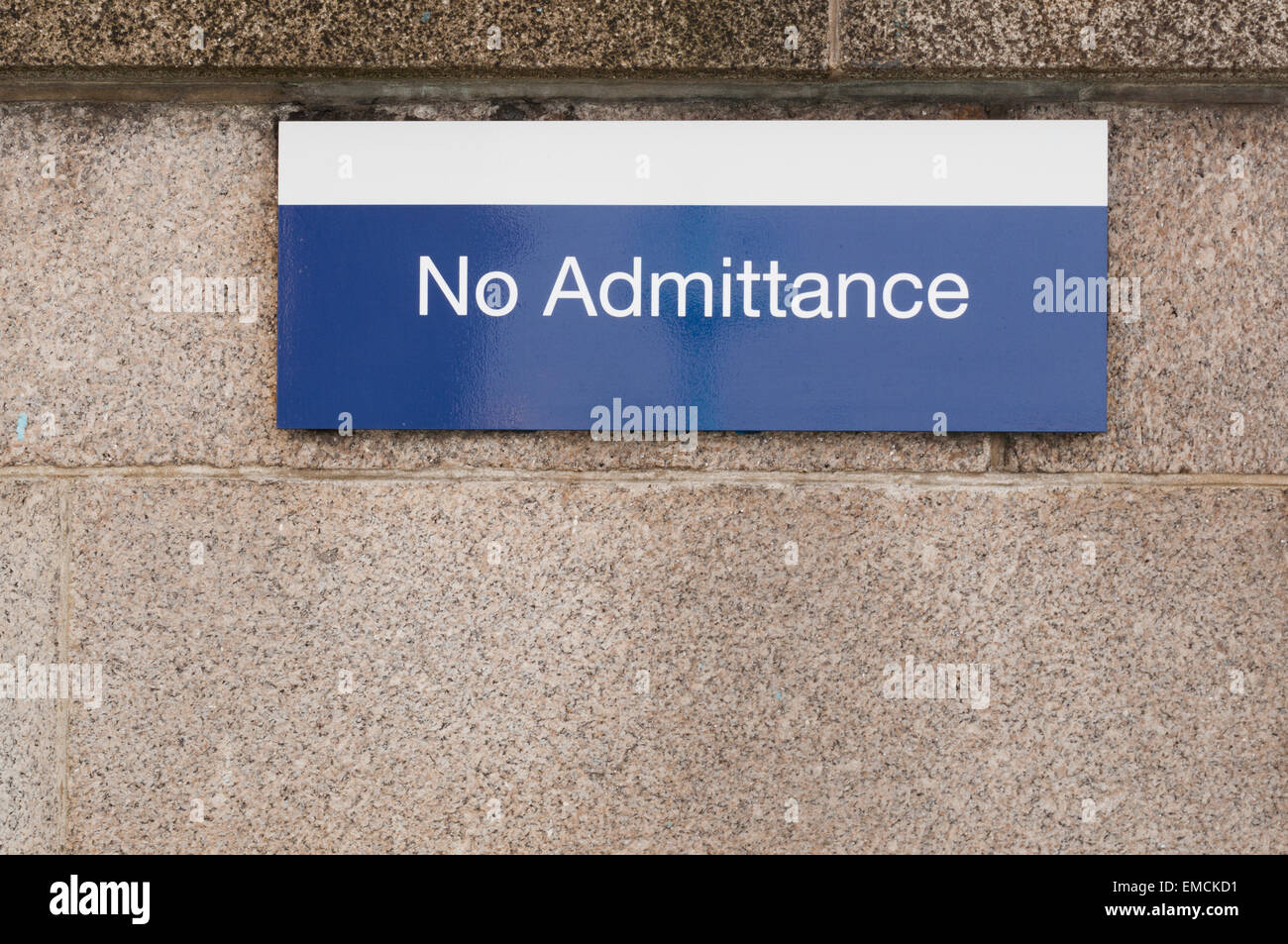 No admission sign mounted on a concrete wall Stock Photo - Alamy